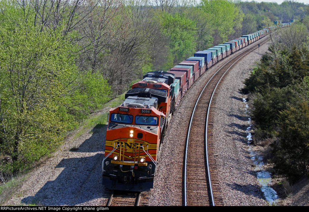 BNSF 5086 Heads down grade and hill!!